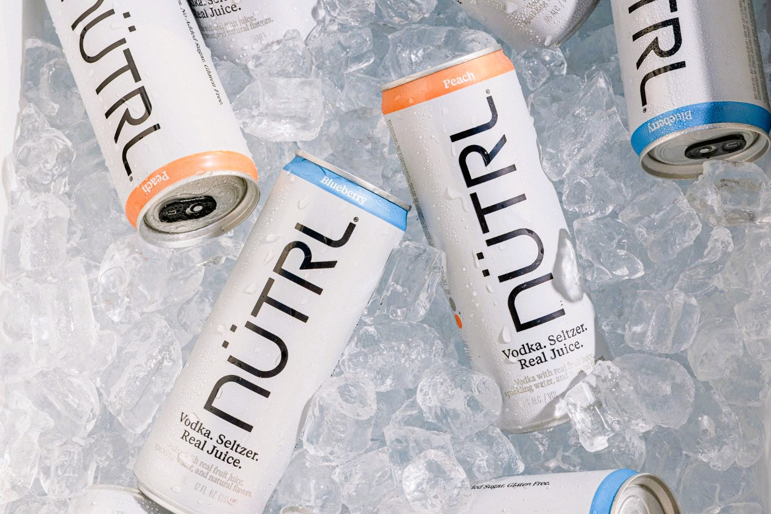 NÜTRL Introduces Two New Vodka Hard Seltzer Flavors: Blueberry & Peach